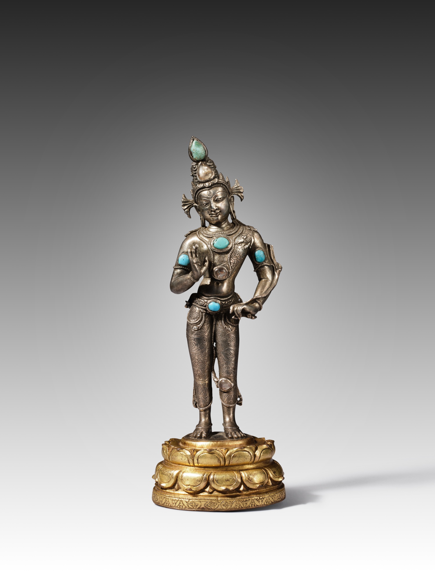The Nyingjei Lam gem-inset silver and gilt-copper figure of ...