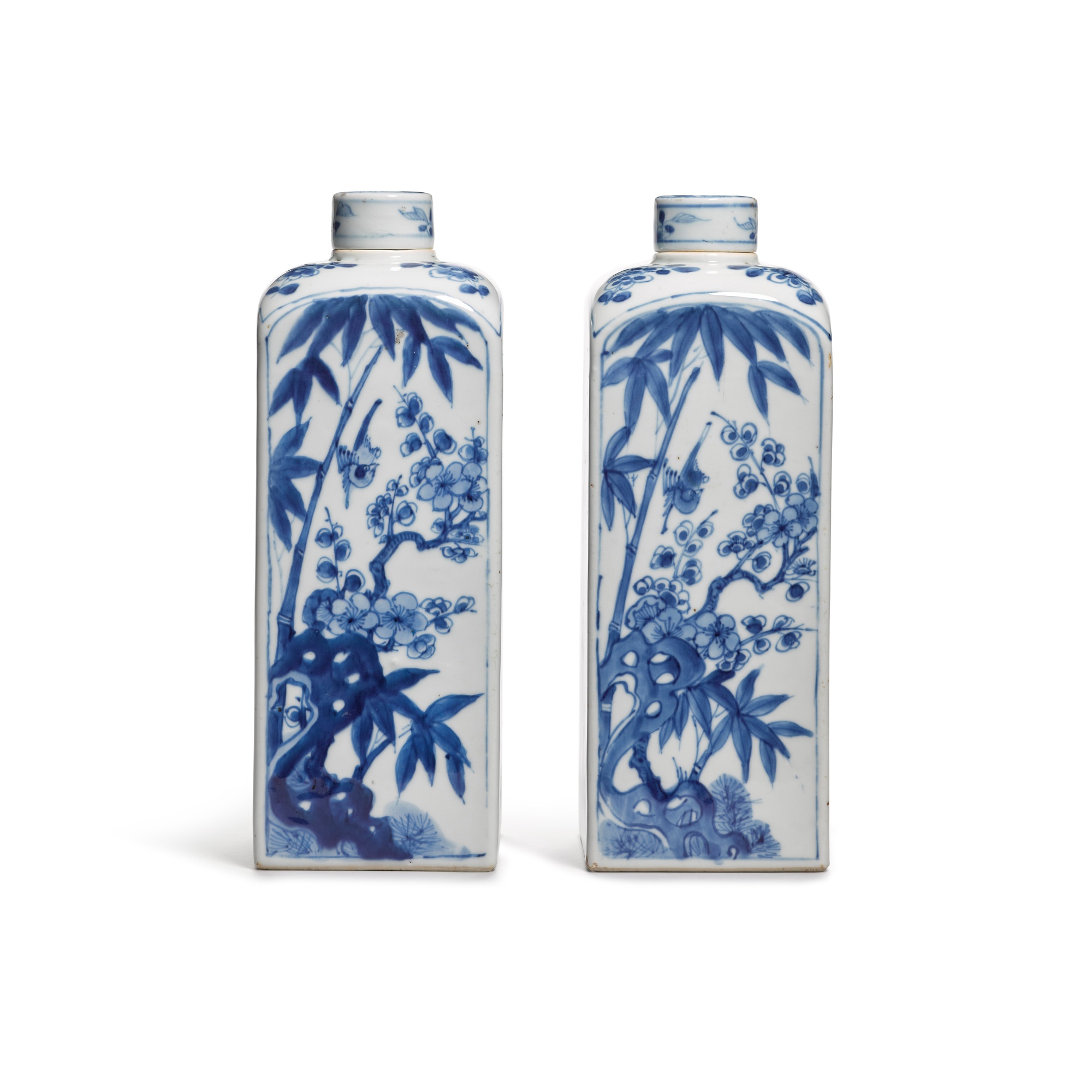 A pair of blue and white square-form bottles and covers, Qing dynasty ...