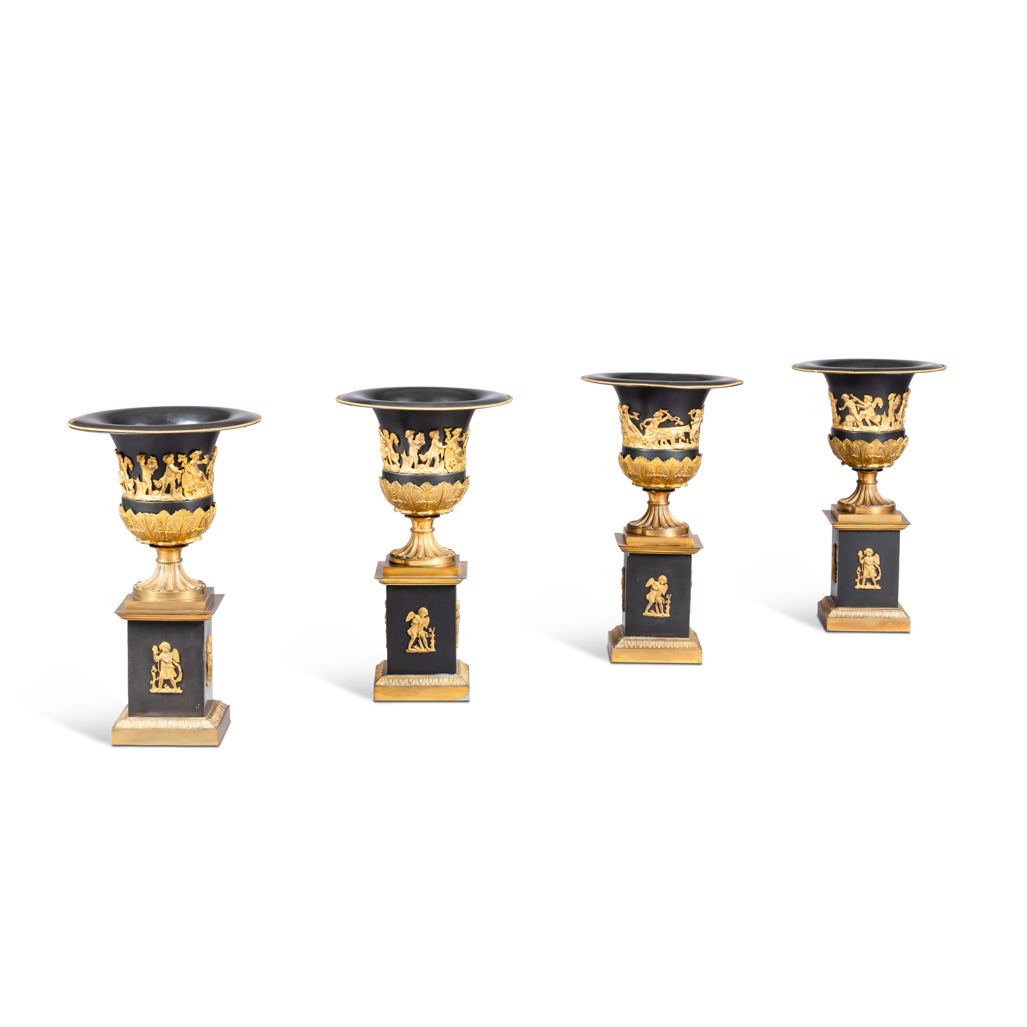 A set of four Empire style patinated and gilt-bronze vases | Suite de ...