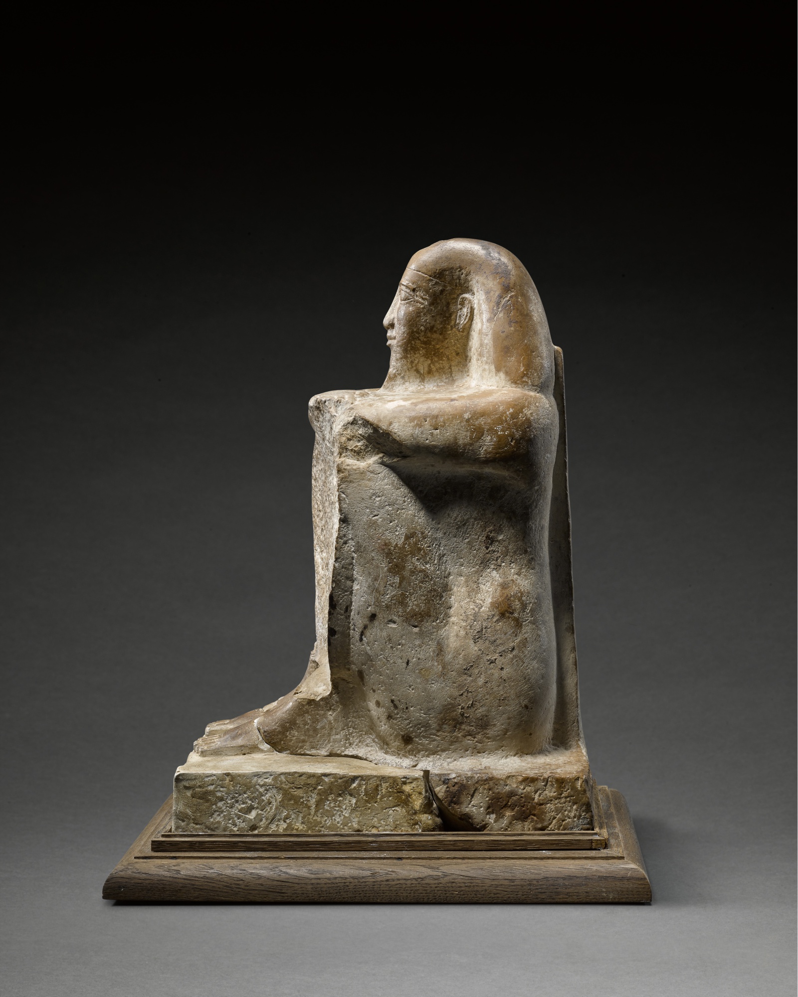 An Egyptian Limestone Block Statue of a Man, 3rd Intermediate Period ...